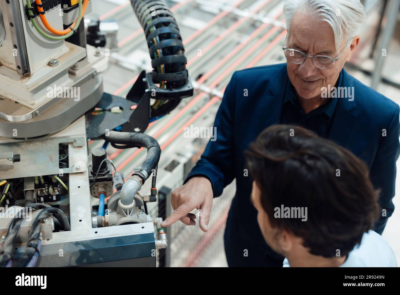 Businessman in factory having hi-res stock photography and images - Alamy