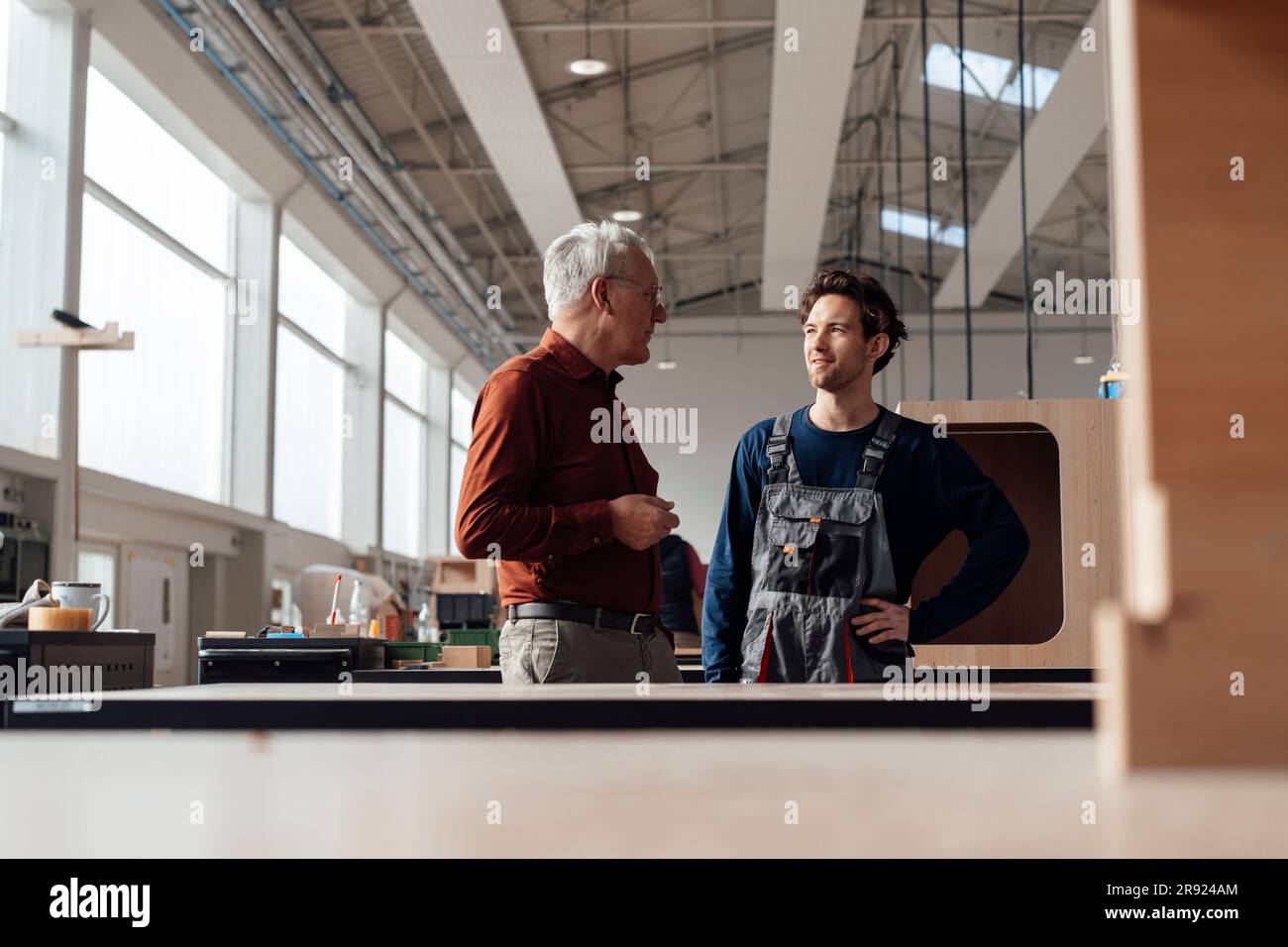 Two colleagues having workshop hi-res stock photography and images - Alamy