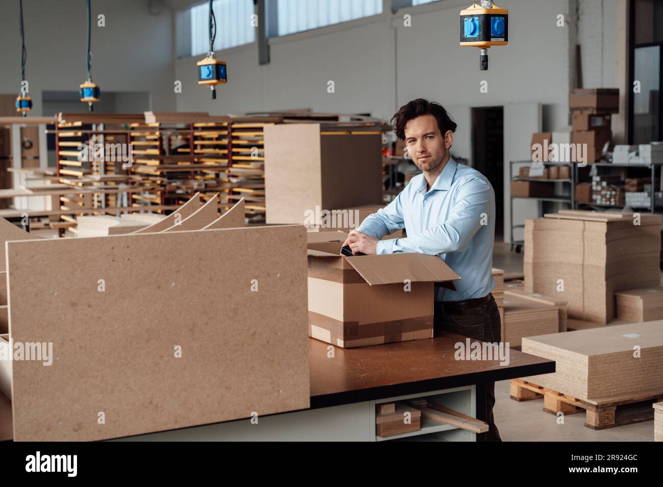 Cardboard in industry hi-res stock photography and images - Alamy