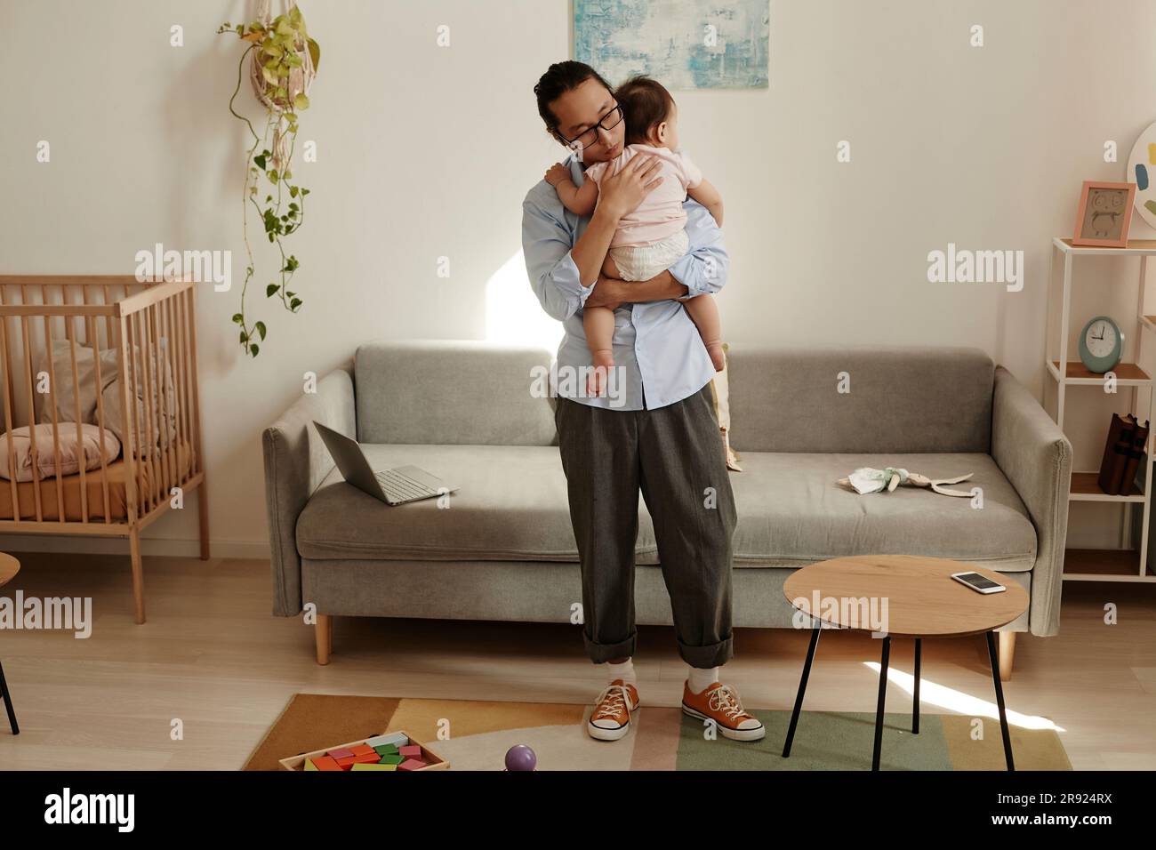 Child taking care of her father hi-res stock photography and images - Alamy