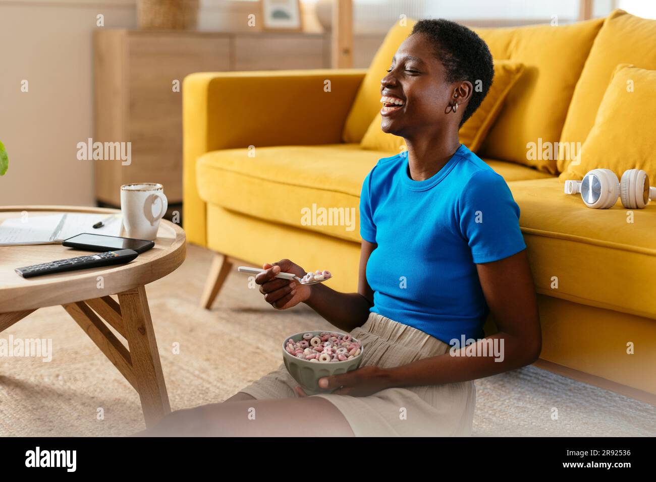 Tv watching eating hi-res stock photography and images - Alamy