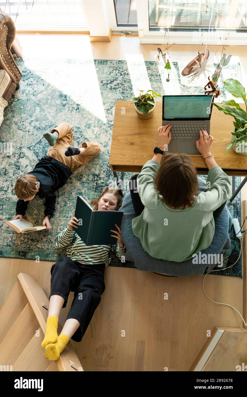 Overhead working with children hi-res stock photography and images - Alamy