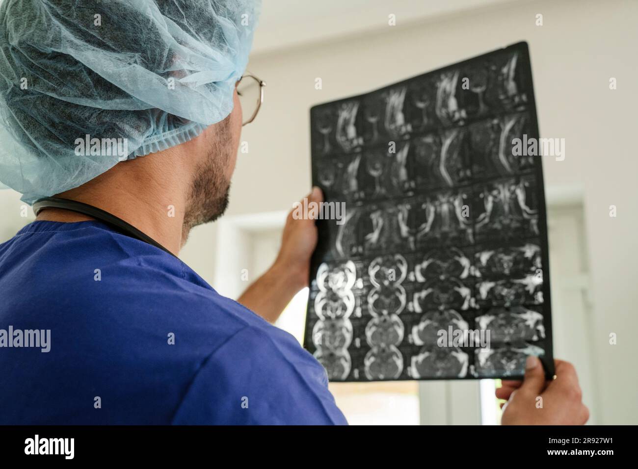 Radiologist examining x-ray at clinic Stock Photo - Alamy