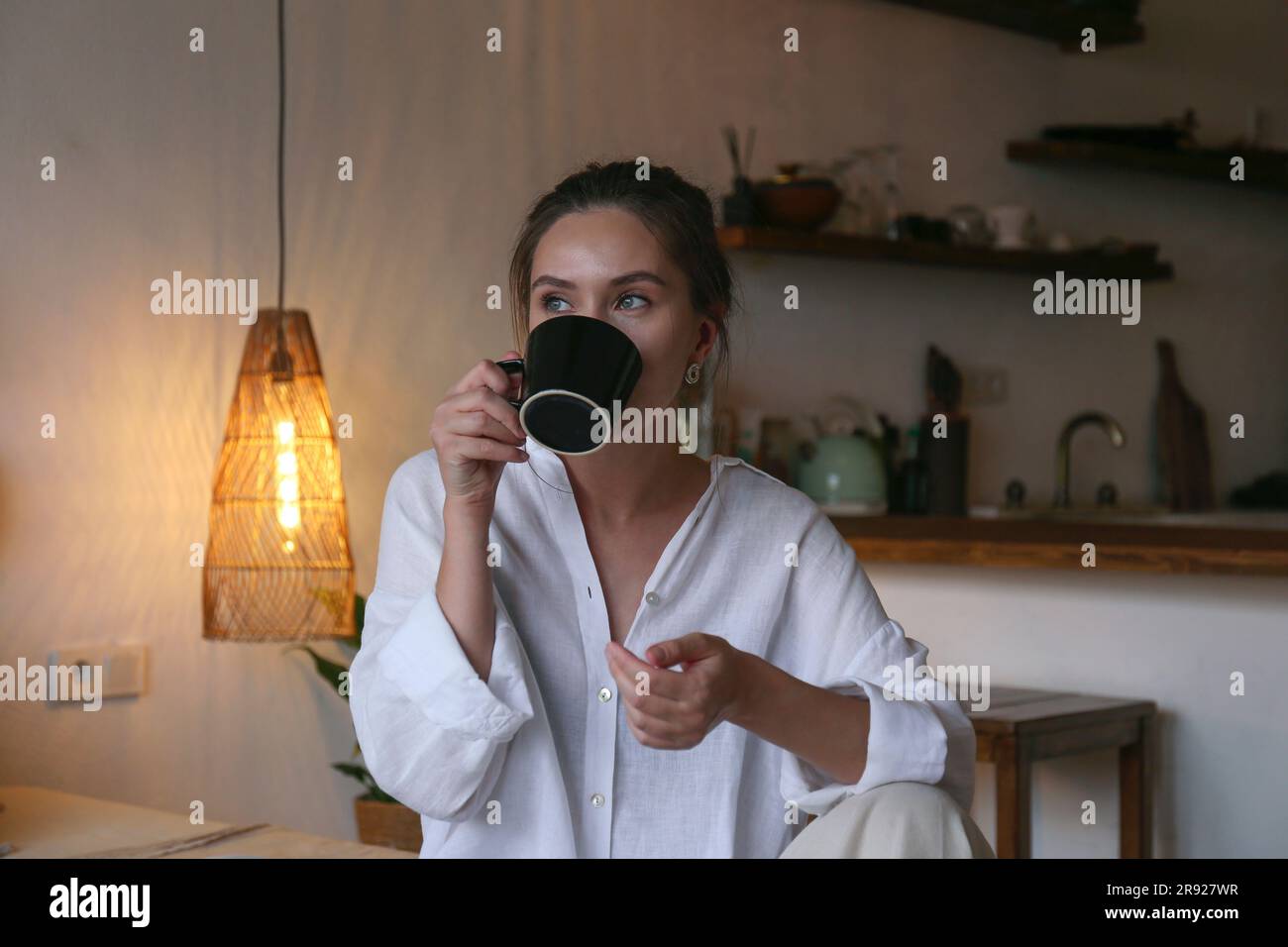 Woman enjoying coffee hi-res stock photography and images - Alamy
