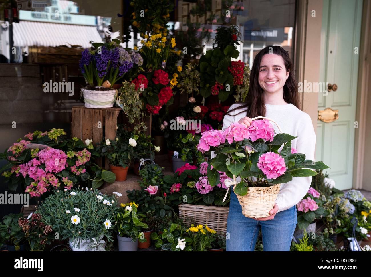 Happy florist hi-res stock photography and images - Alamy