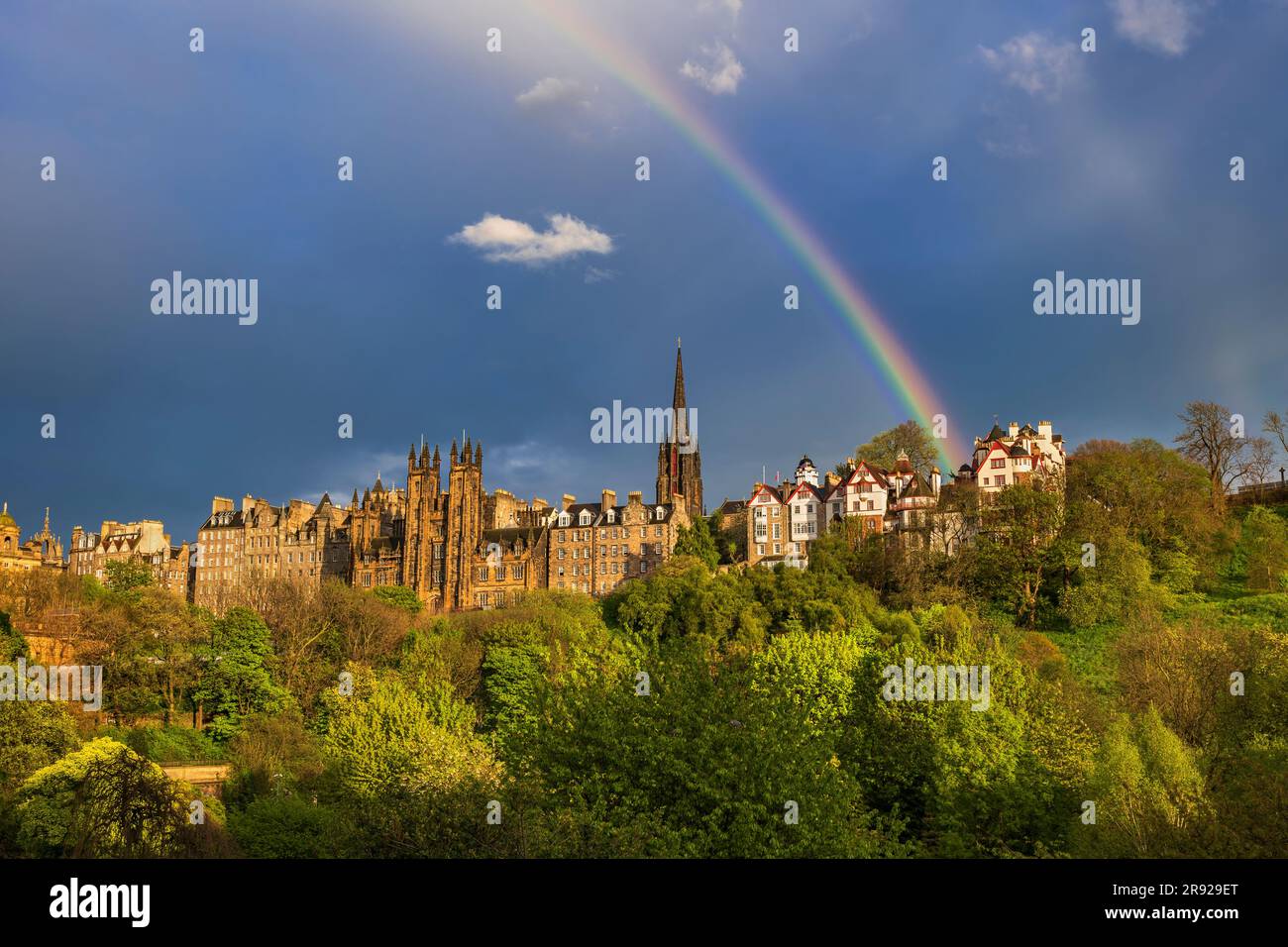 UK, Scotland, Edinburgh, Rainbow arching over old town skyline Stock ...