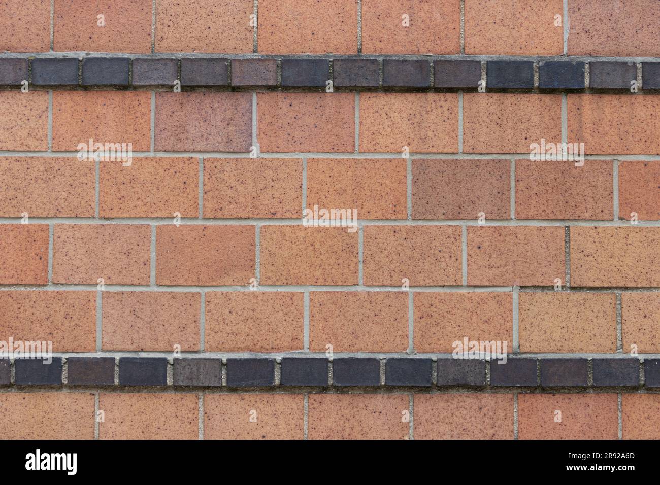 wide terra cotta bricks in stretcher or running bond with stripes of ...