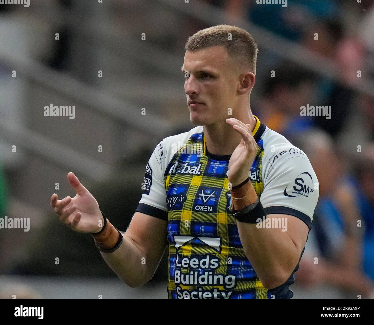 Ash Handley #5 of Leeds Rhinos salutes the fans after the Betfred Super ...