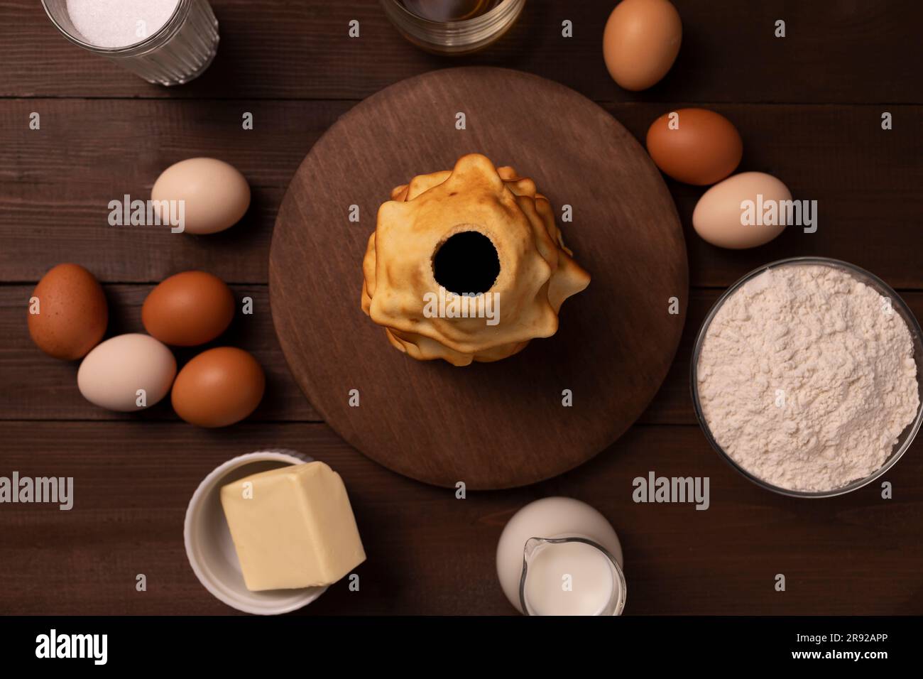 Top view baumkuchen, sakotis ,sekacz ingredients on wooden table ...