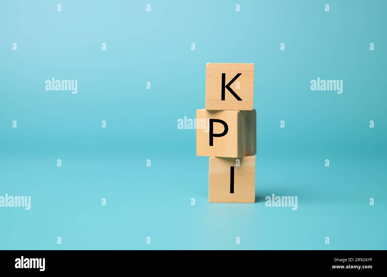 Key Performance Indicator Businessman Holding Wooden Cube With Kpi