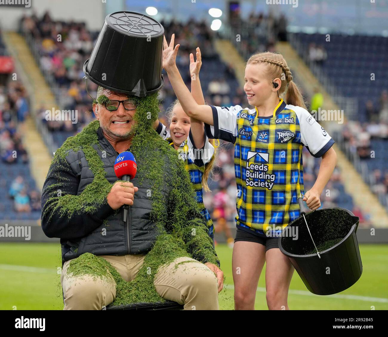 Rob Burrows Daughters Maya and Macy pour buckets of grass over the head ...