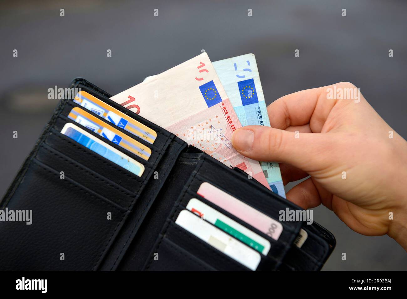 Hand taking hi-res stock photography and images - Alamy