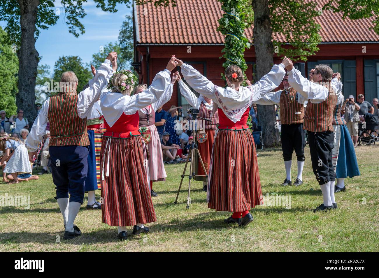 Traditional Swedish midsummer celebration with Folkdance and dancing ...