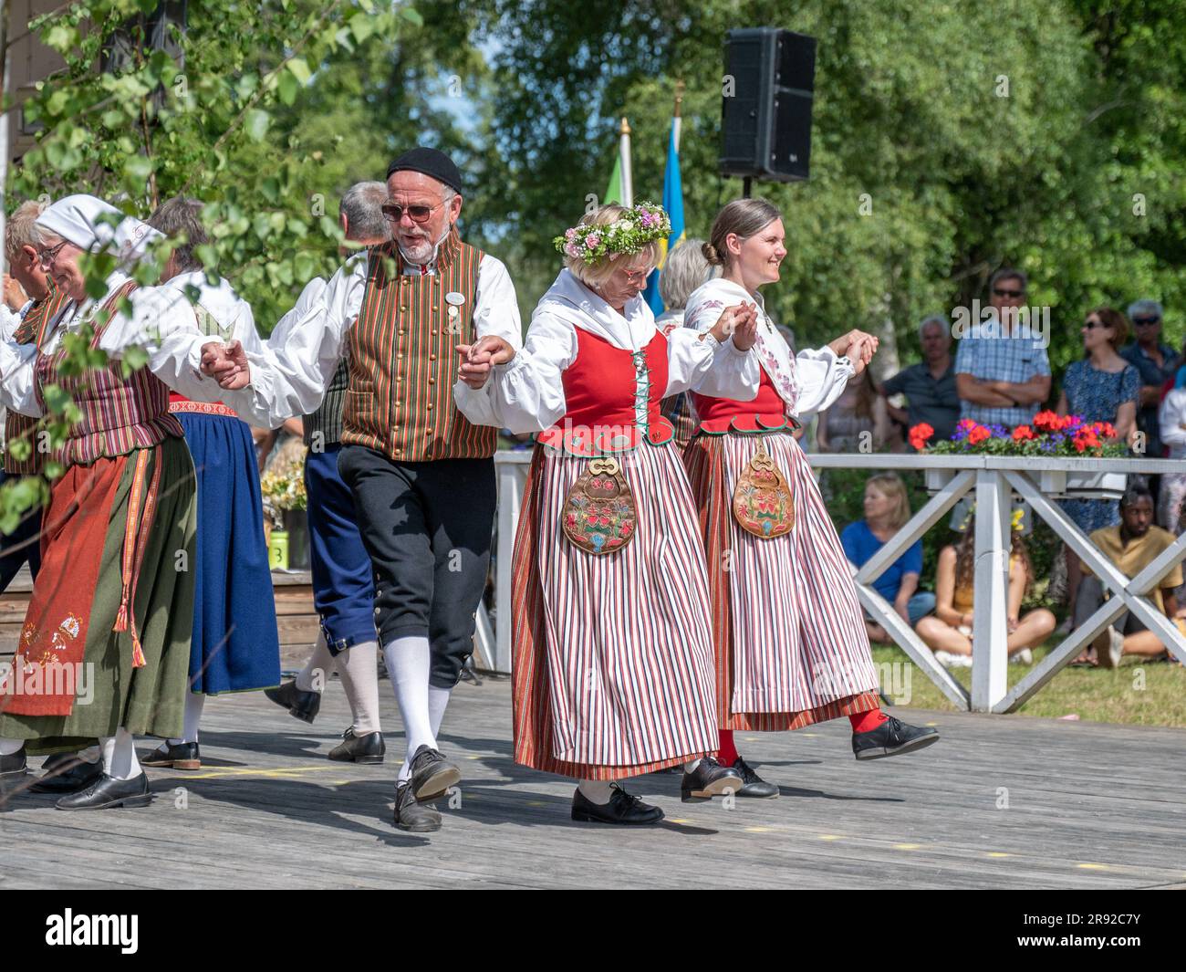 Traditional Swedish midsummer celebration with Folkdance and dancing ...