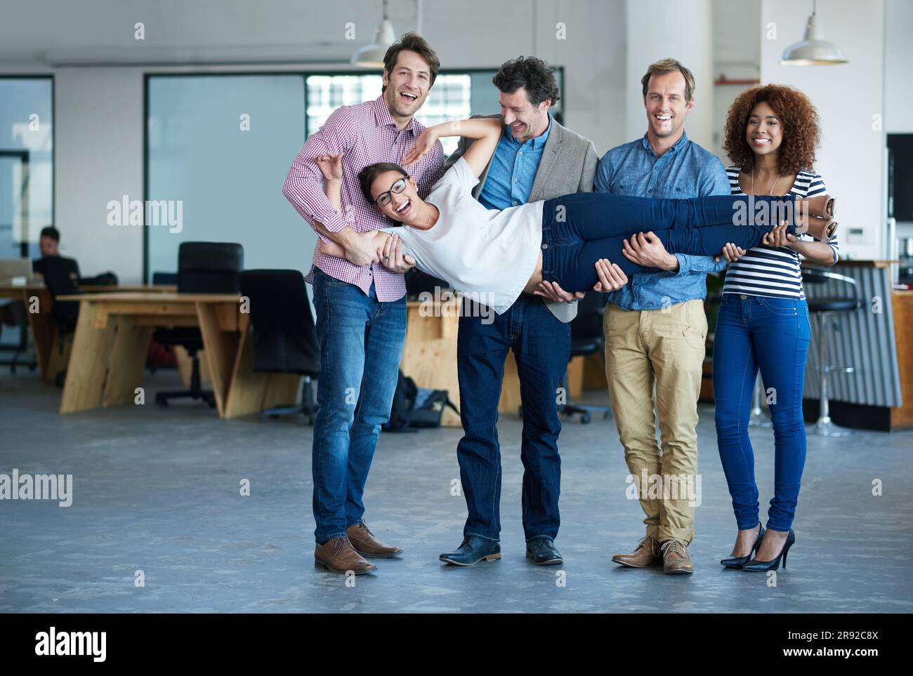 Funny, portrait or happy web designers in office with support, teamwork ...