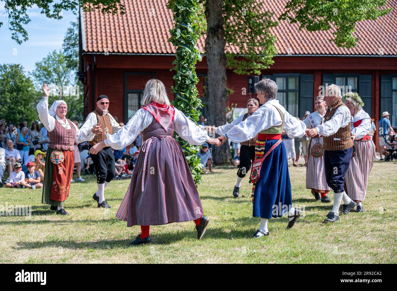 Dance around maypole traditional costume hi-res stock photography and ...