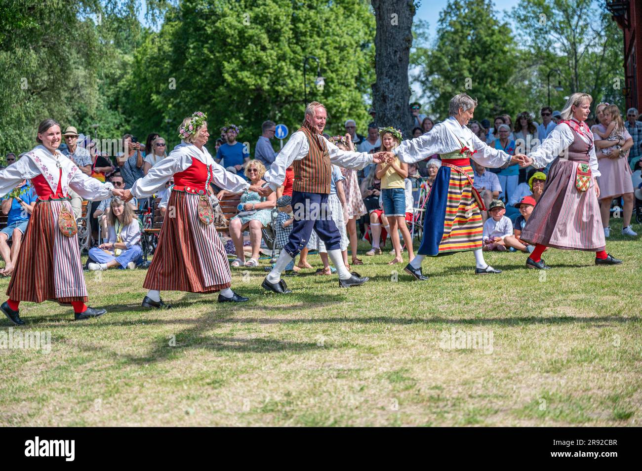 Traditional Swedish midsummer celebration with Folkdance and dancing ...