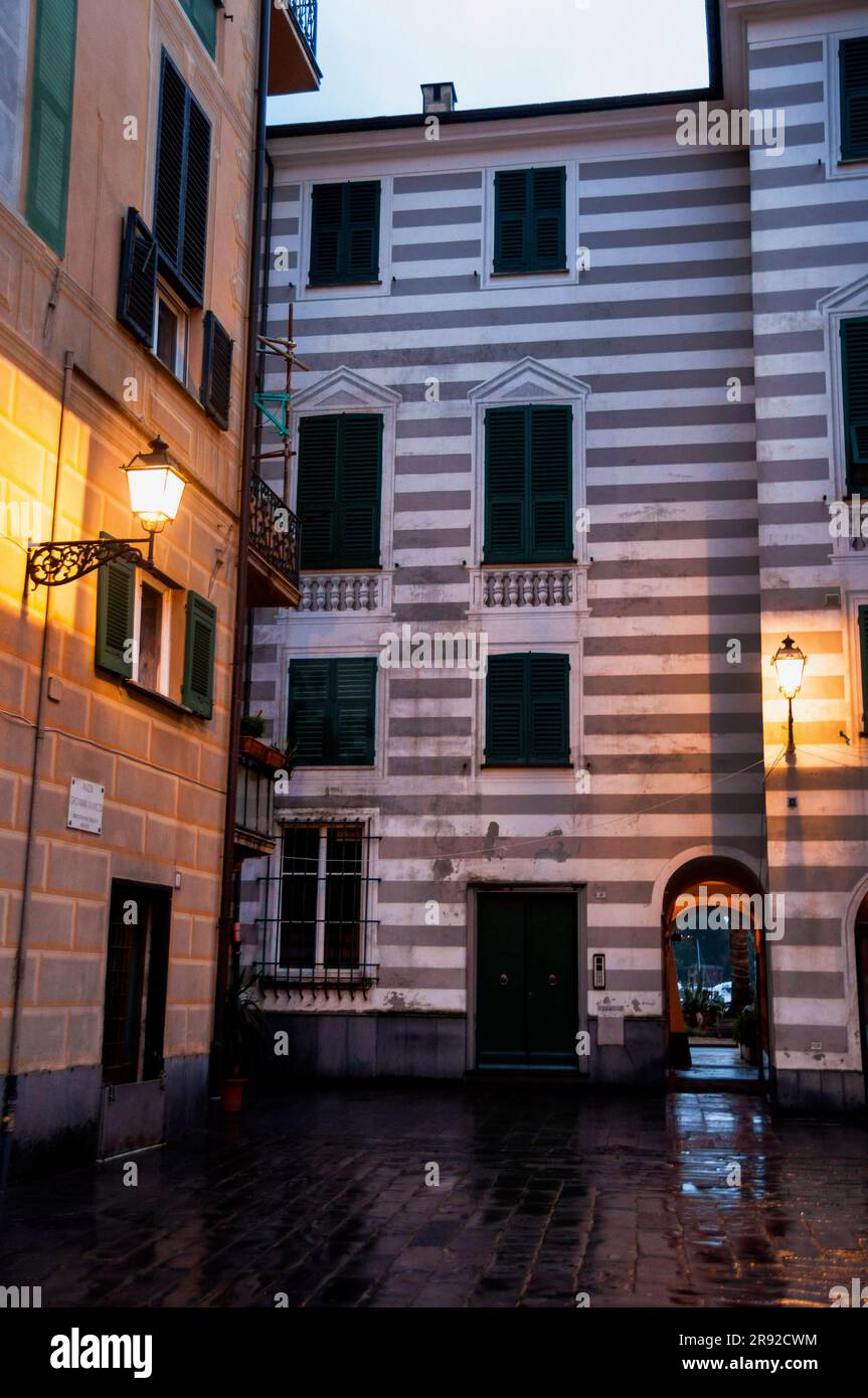 Ligurian characteristic grey and white striped building with trompe l ...