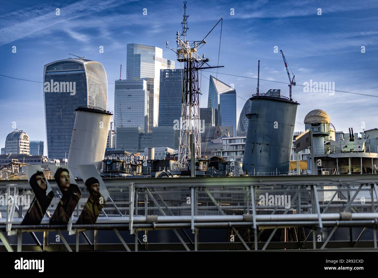 A majestic bridge with towering skyscrapers in the background, creating ...