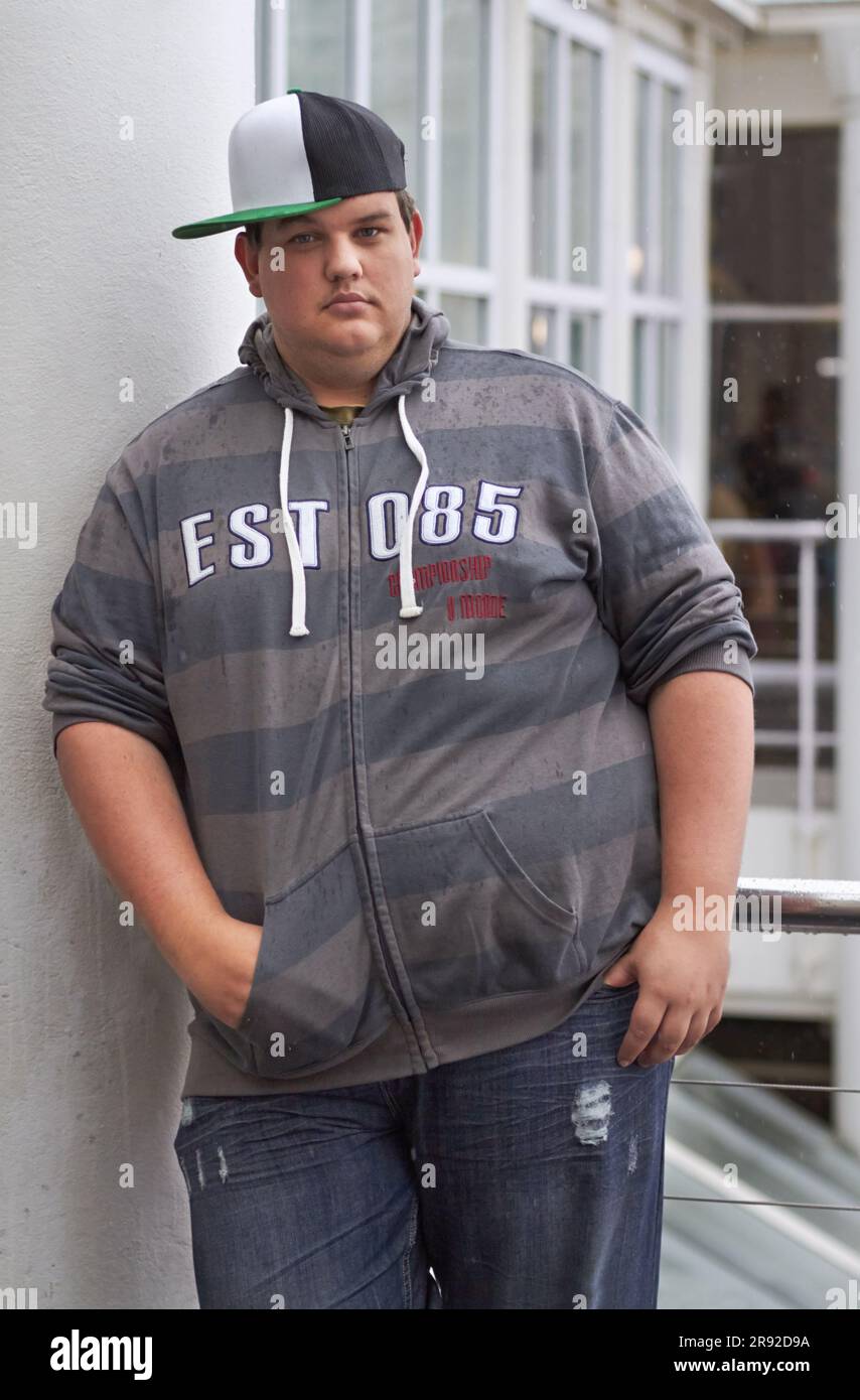 Plus size, young guy and portrait outdoor with hipster and urban style ...