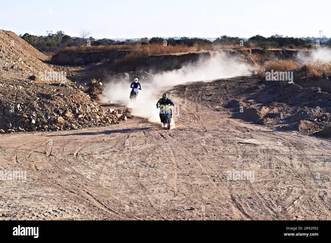 People in race, motorcycle and sport with speed, action and energy on ...