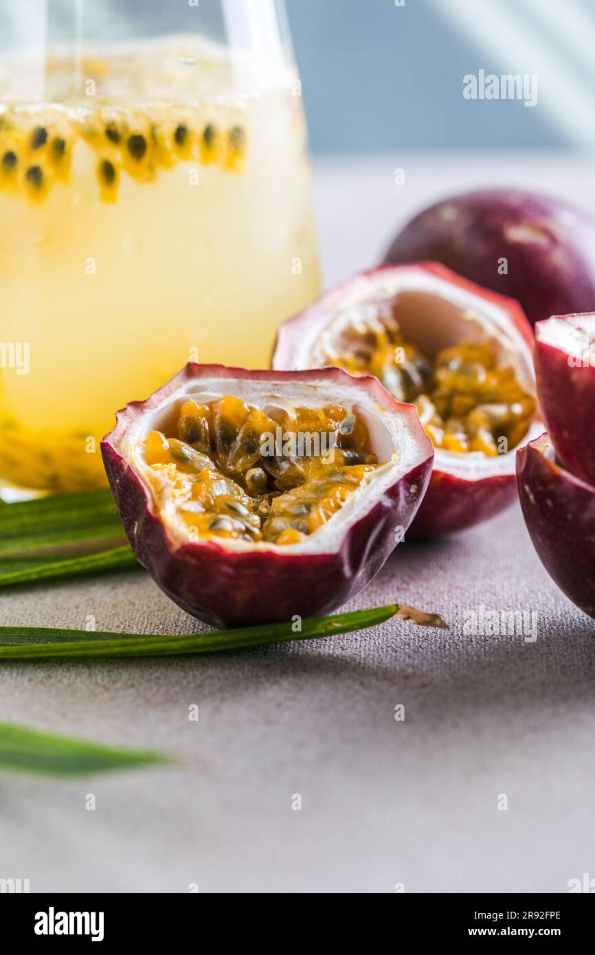 Pure passion, alcoholic cocktail with syrup, lime, orange juice, soda ...