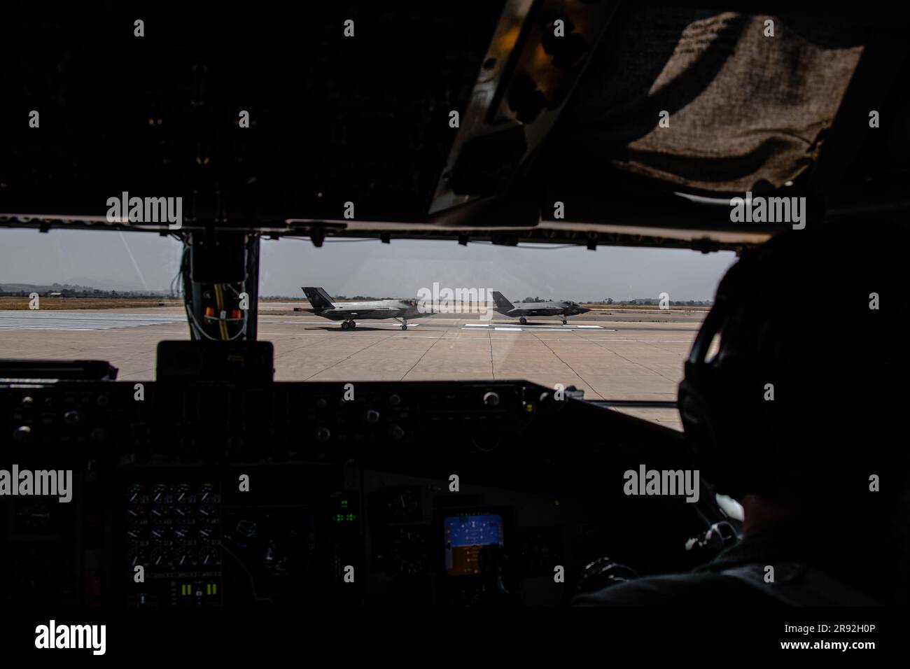 U.S. Marine Corps Maj. Robert Ahern, left, an F-35C Lighting II pilot ...