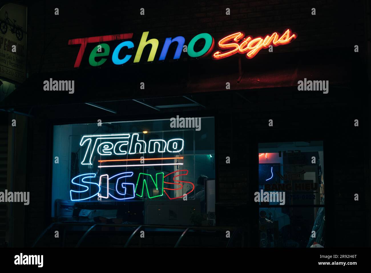 Techno Signs signs at night, Philadelphia, Pennsylvania Stock Photo - Alamy
