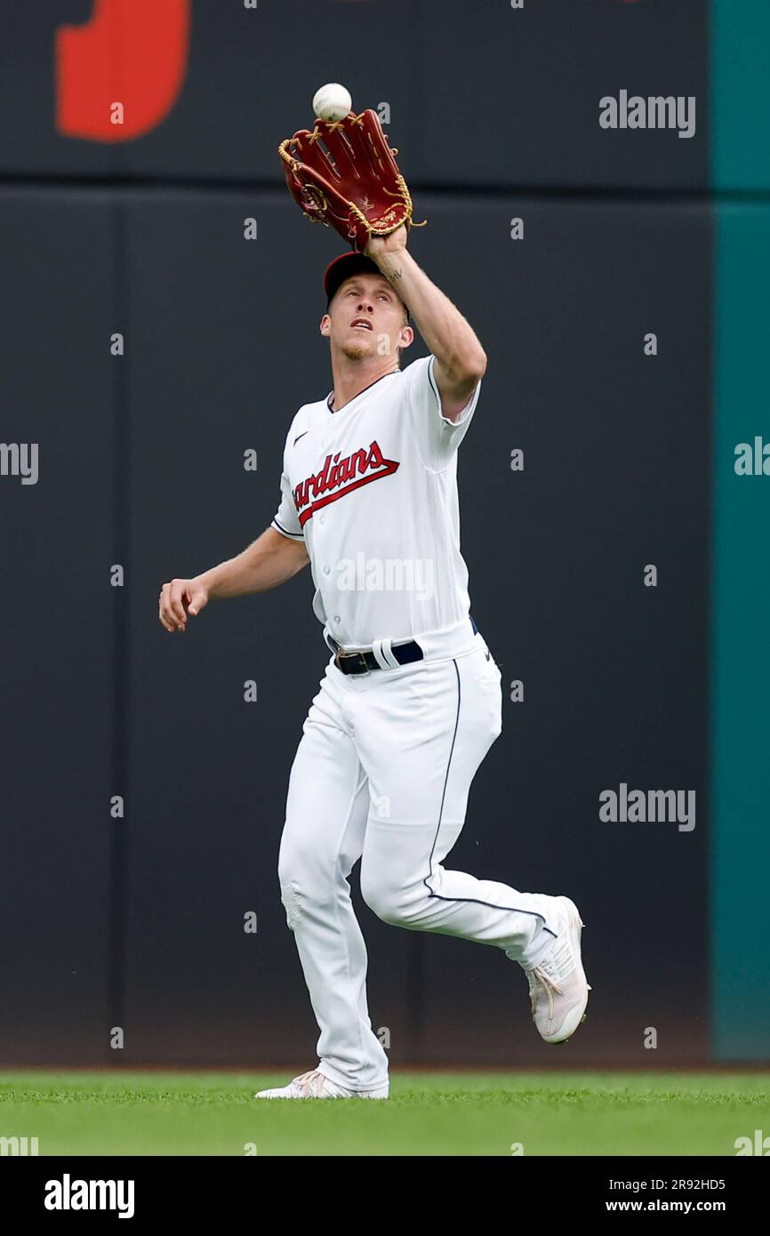 Cleveland Guardians center fielder Myles Straw catches a ball hit by ...