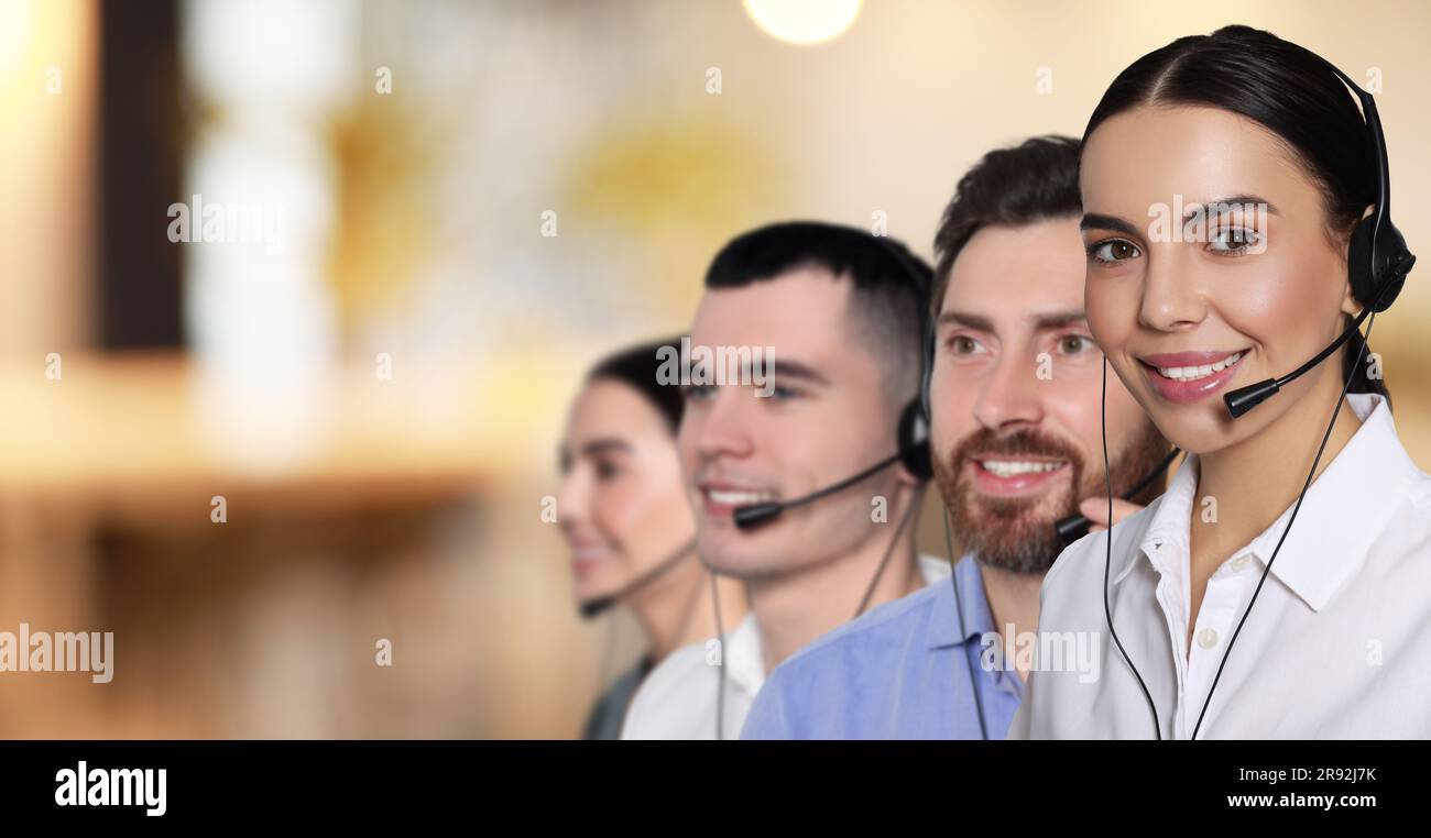 Hotline operators with headsets in office, space for text. Banner ...