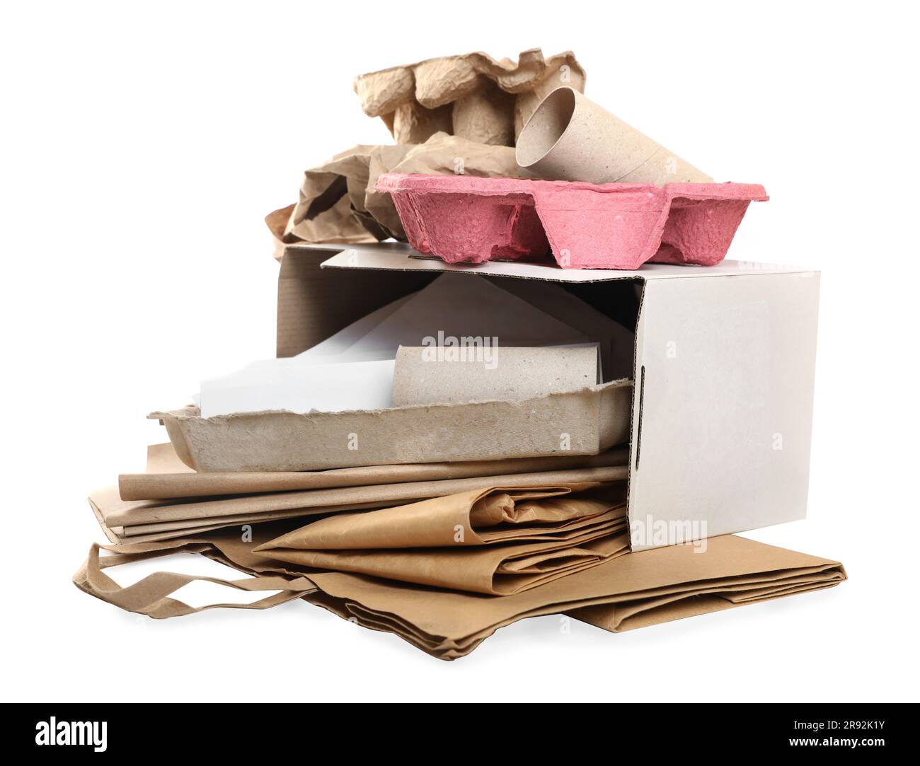 Stack of different waste paper on white background Stock Photo - Alamy