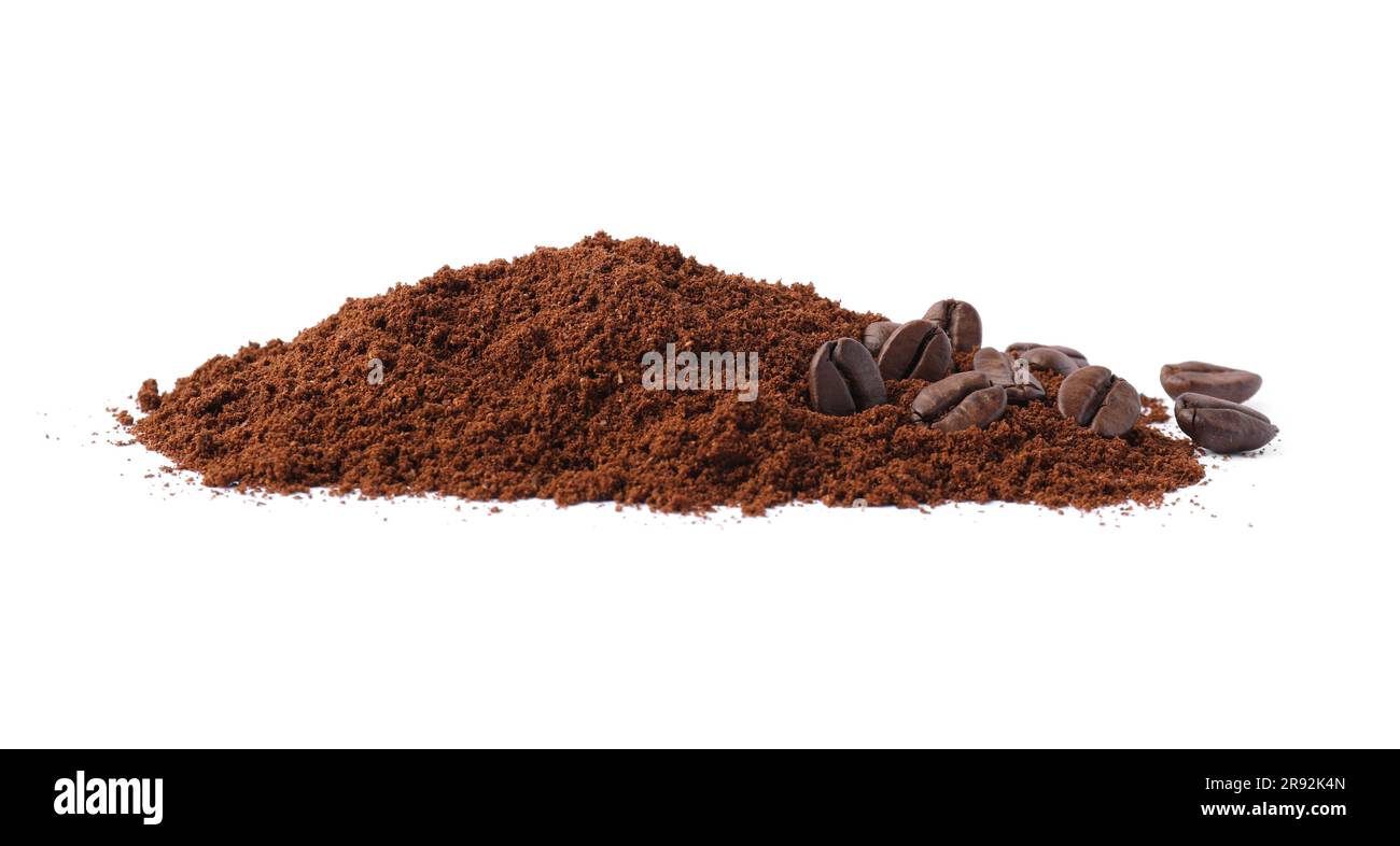 Heap of ground coffee and beans on white background Stock Photo - Alamy