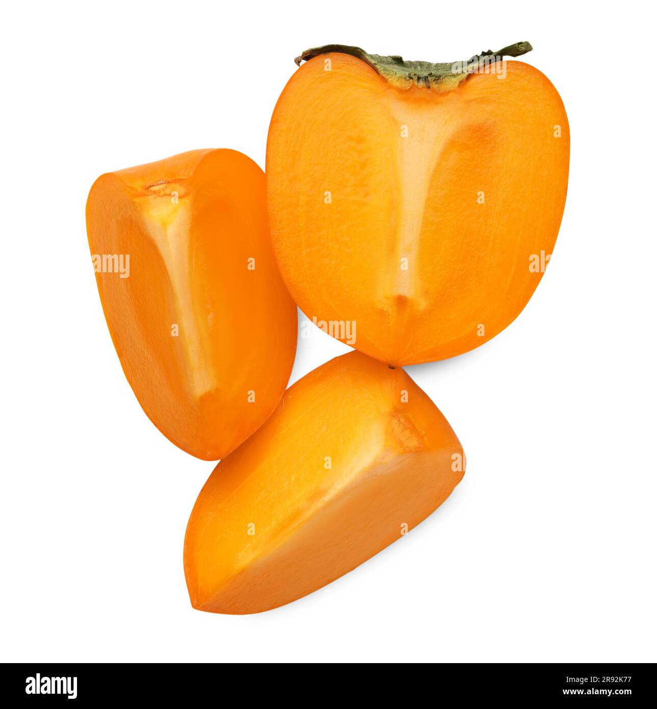 Cut delicious ripe juicy persimmon on white background, top view Stock ...