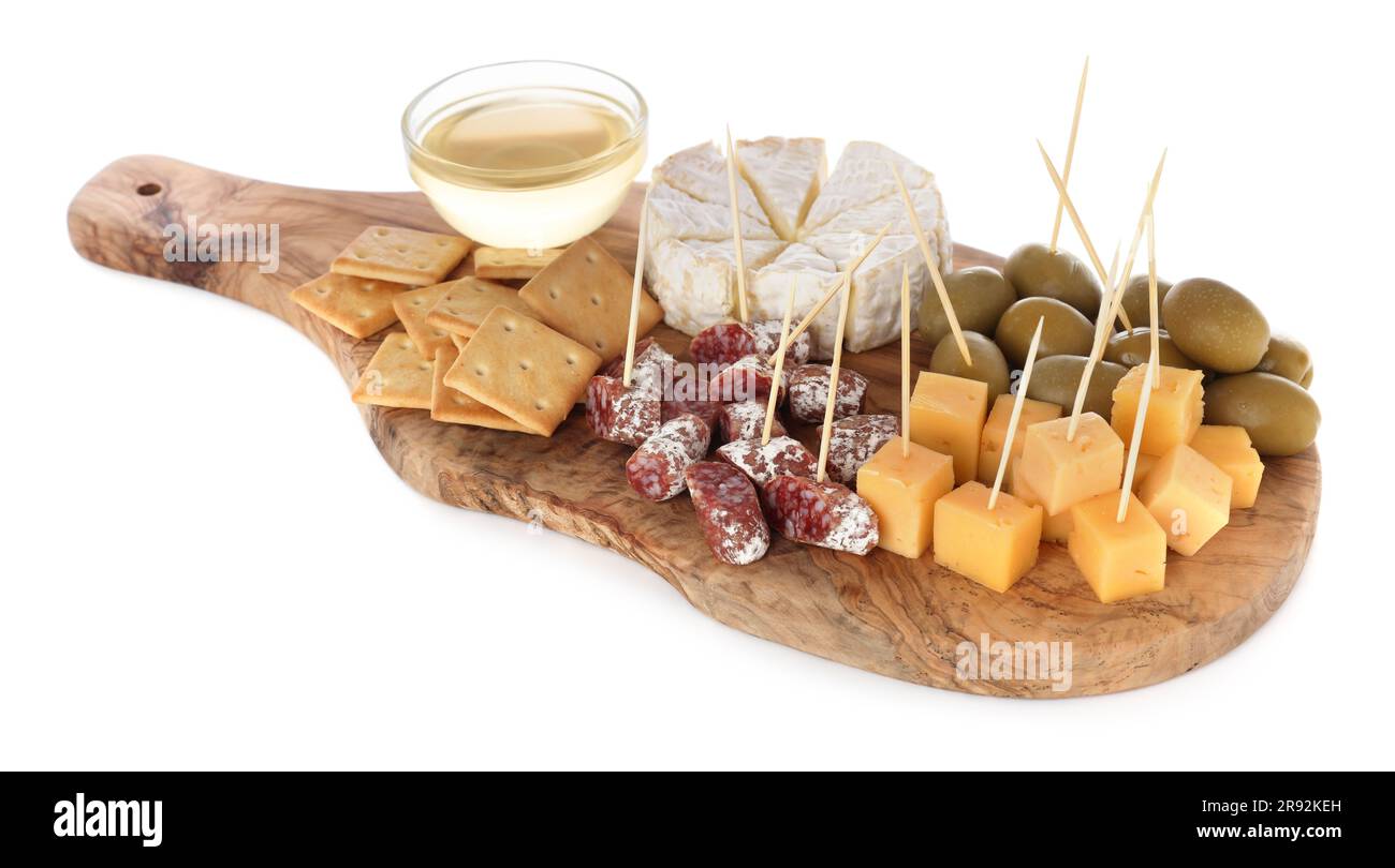 Toothpick appetizers. Tasty cheese, sausage, crackers and olives on ...
