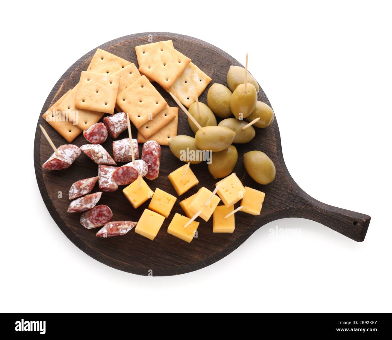 Toothpick appetizers. Tasty cheese, sausage, crackers and olives on ...