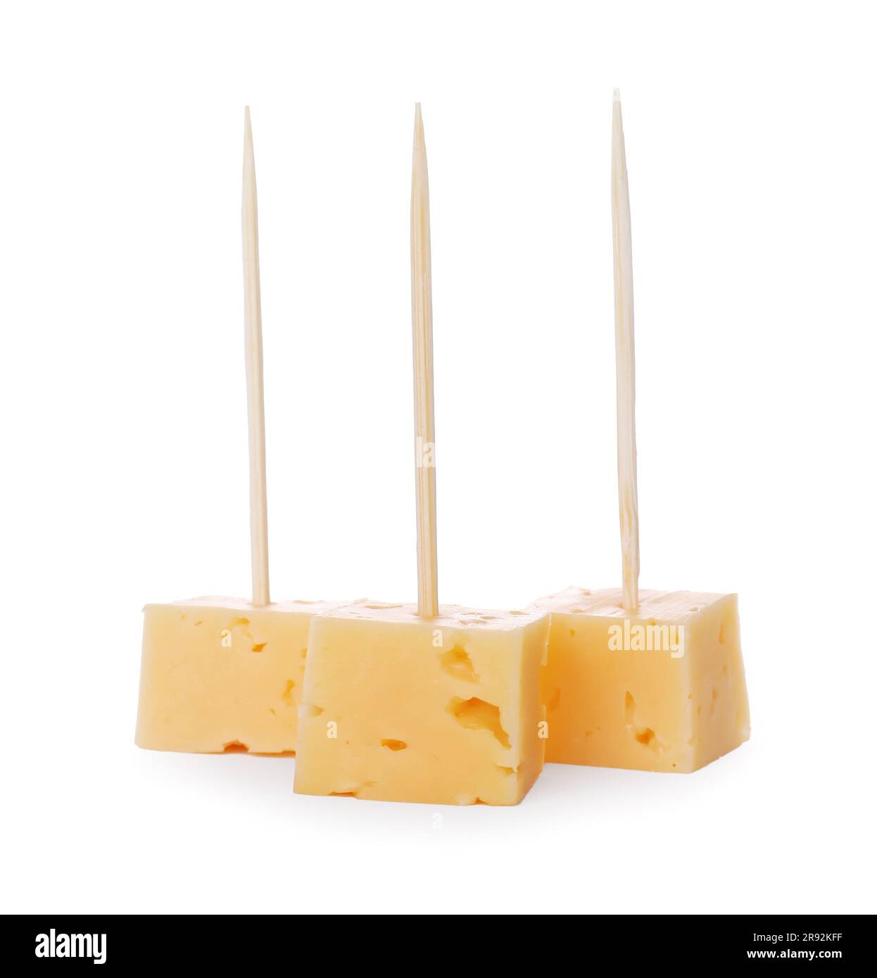 Toothpick appetizers. Tasty cheese pieces on white background Stock ...