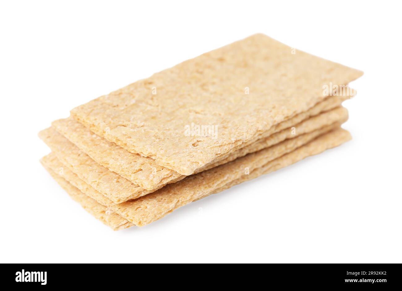 Stack of fresh crunchy rye crispbreads on white background Stock Photo ...