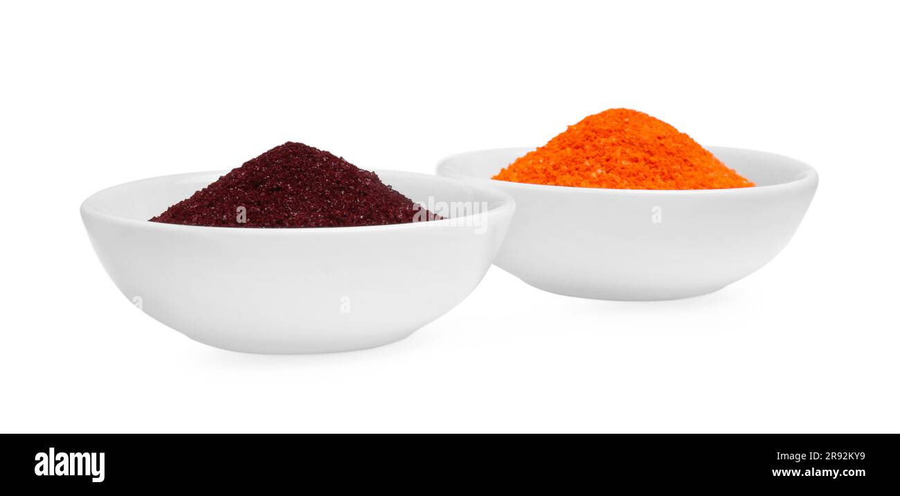 Bowls with food coloring on white background Stock Photo - Alamy