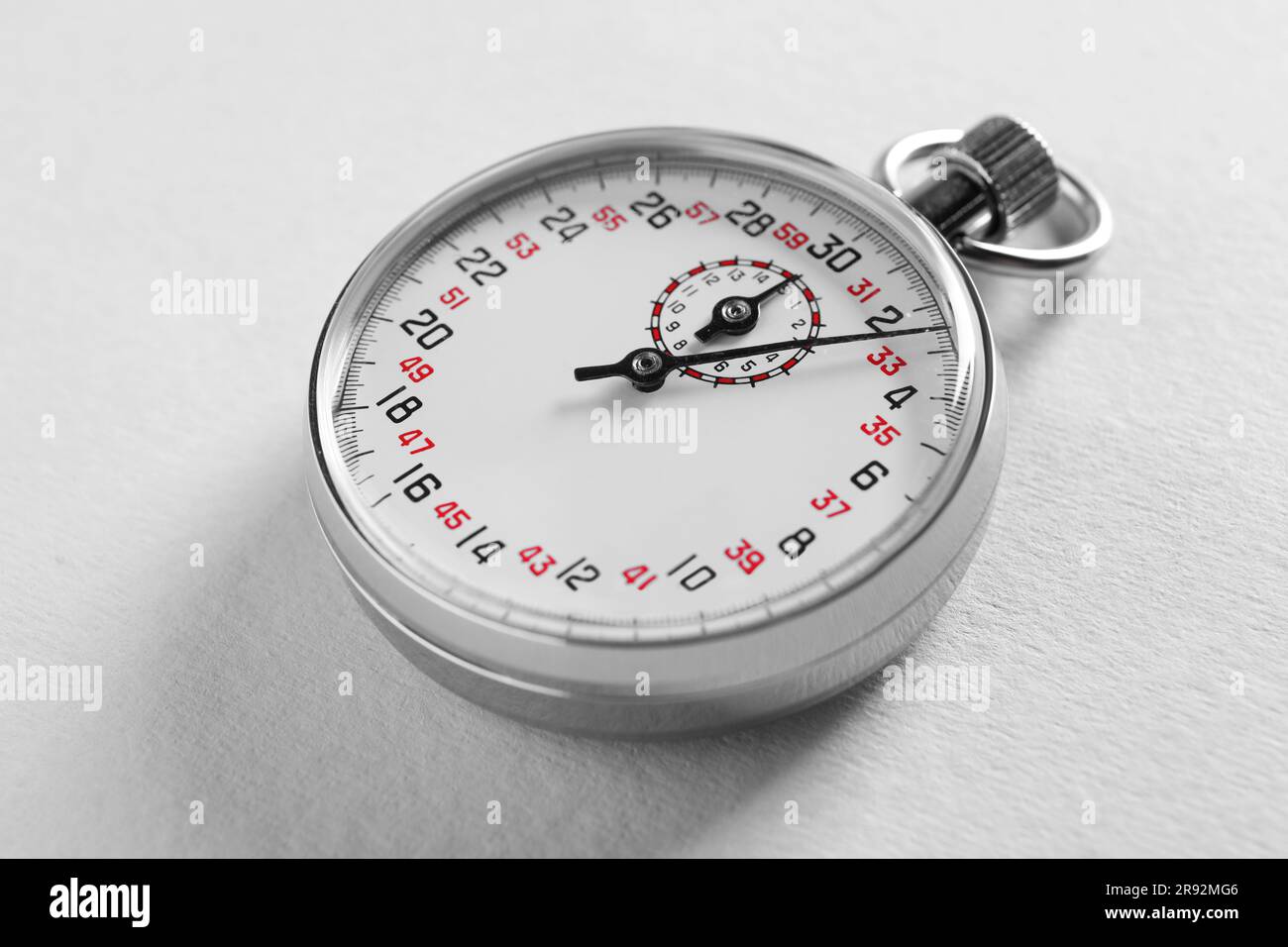 Vintage timer on light grey background. Measuring tool Stock Photo - Alamy