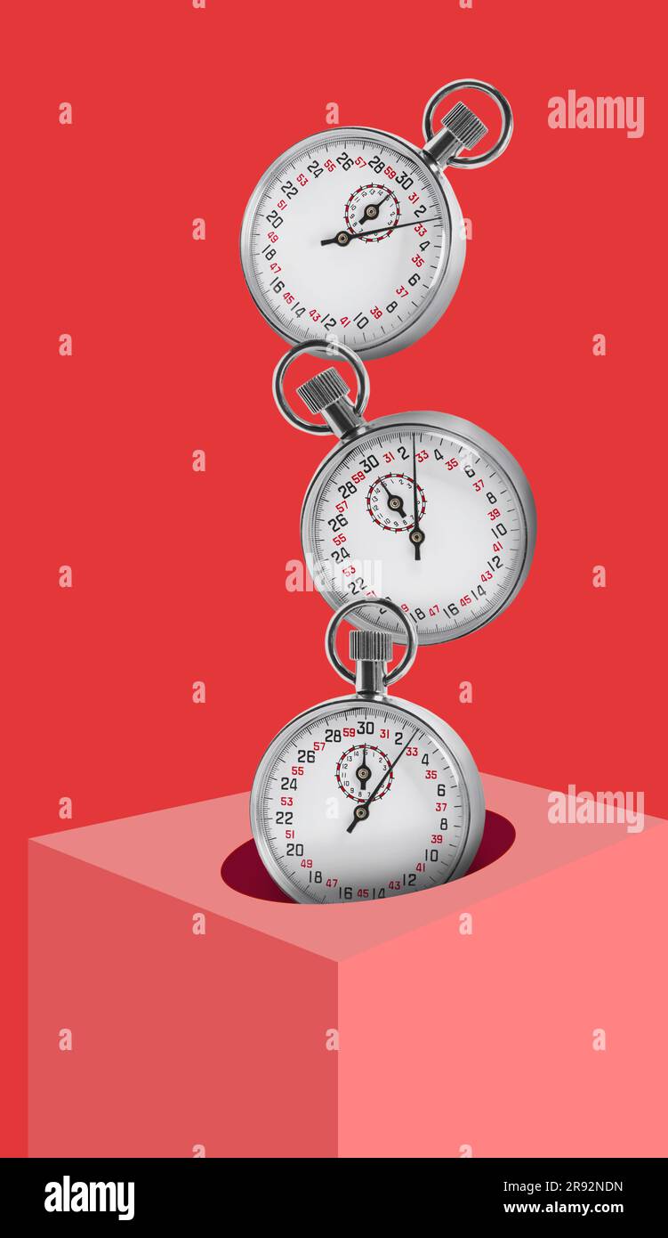 Concept of time. Vintage timer falling into cube on red background ...