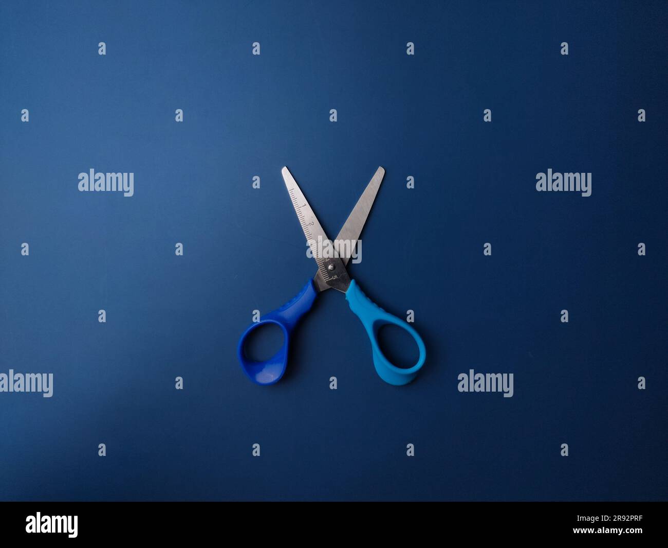 Blue scissors hi-res stock photography and images - Alamy