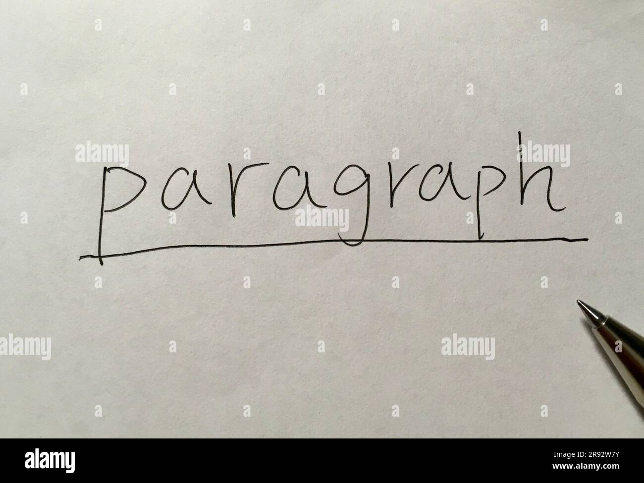 Paragraph concept word on paper background Stock Photo - Alamy
