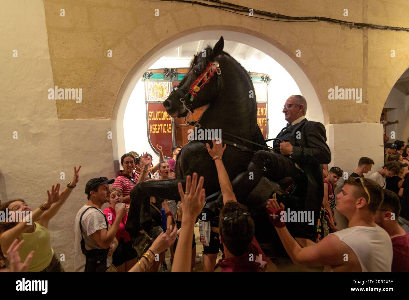 Ciutadella, Spain. 23rd June, 2023. A 'caixer' (horse rider) rears up ...