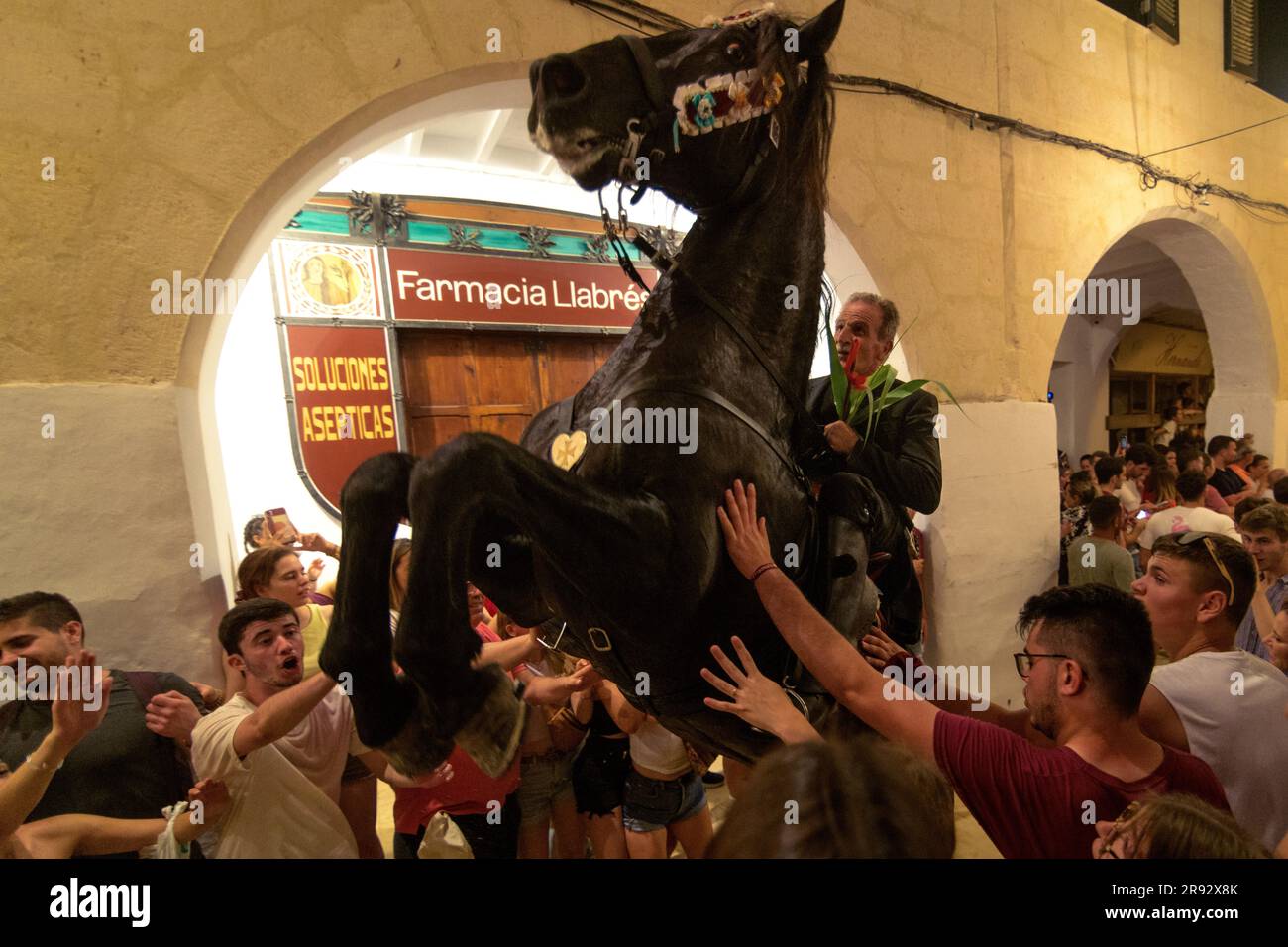 Ciutadella, Spain. 23rd June, 2023. A 'caixer' (horse rider) rears up ...