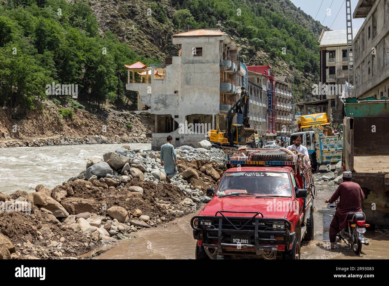Road washed out after heavy flood submerged the Bahrain bazaar and main ...