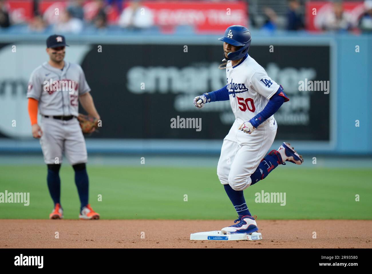 Los Angeles Dodgers' Mookie Betts runs the bases past Houston Astros ...
