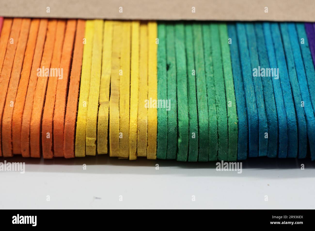 Rainbow coloured Wooden Paddle Pop sticks for arts and crafts Stock ...