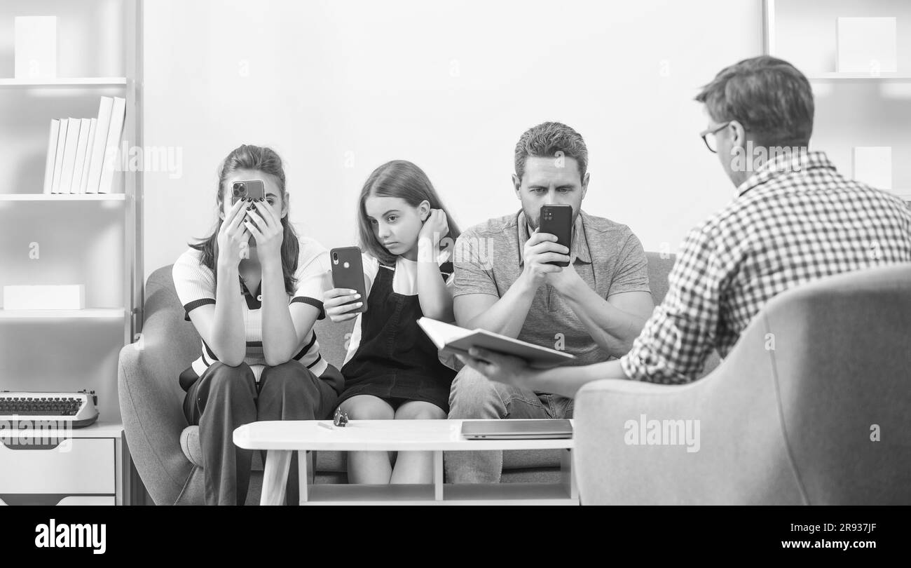 parents with kid talk to social worker. phone addicted mom dad and ...