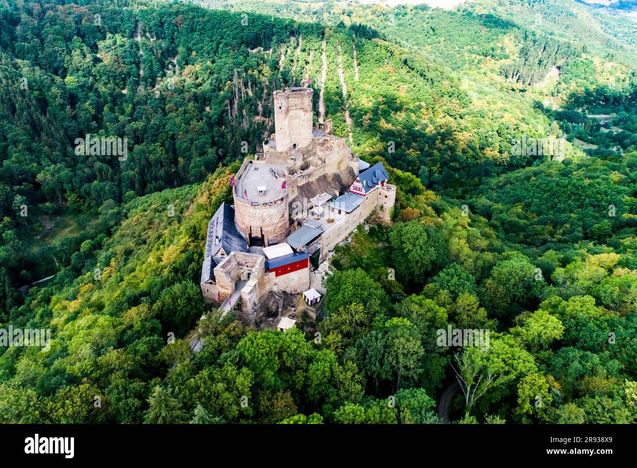 aerial view rock with medieval castle Ehrenburg on it near moselle ...