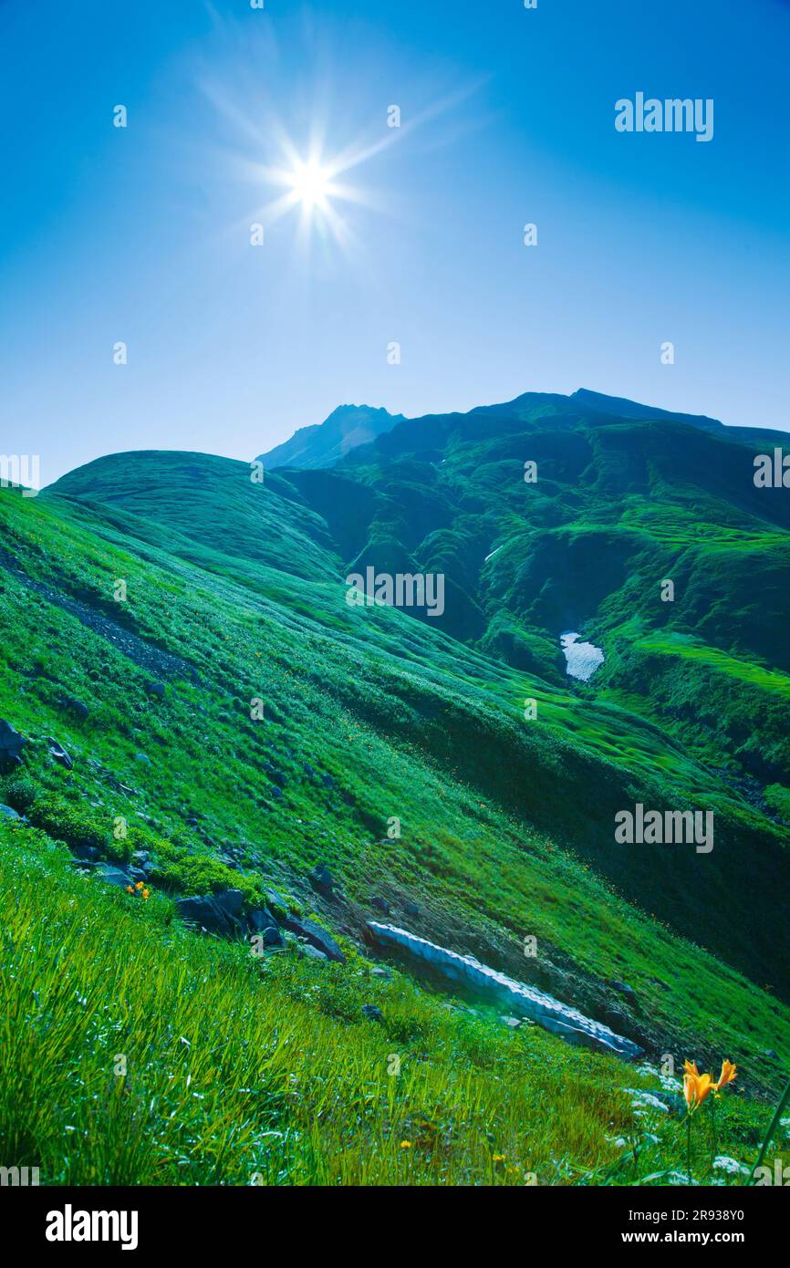 Sun and Mt. Chokaisan Stock Photo - Alamy